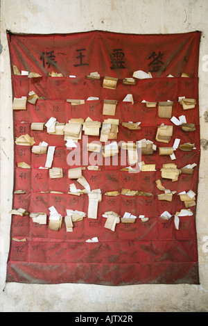 Religious paper slips in the Chinese temple, Lie Sheng Gong, in the ...