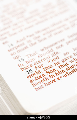 Selective focus of verses in open Holy Bible Stock Photo - Alamy
