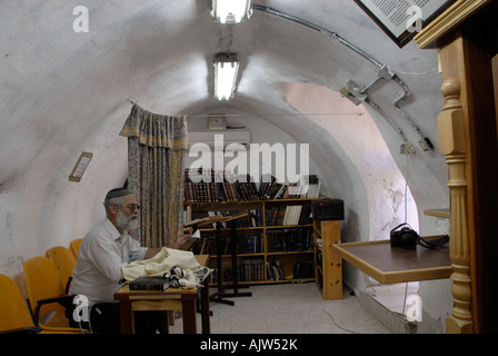 A Jewish settler inside the tomb of Jesse and Ruth located within the ...