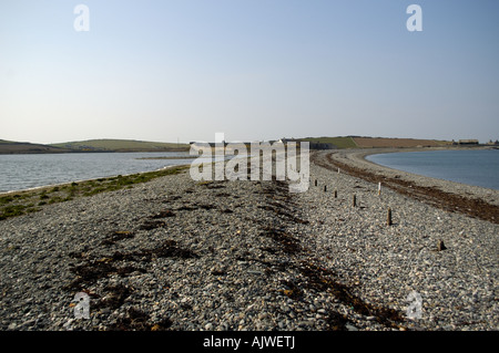 Shingle beach and brackish lagoon at Cemlyn Bay Anglesey North Wales ...