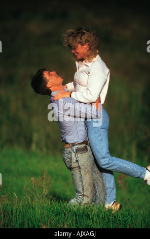 Young happy couple outdoors in autumn Stock Photo - Alamy