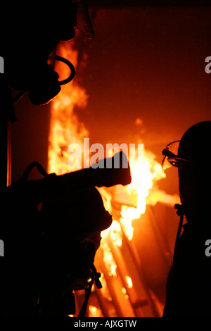 Fire fighters firemen in action to fight a spectacular blaze at the RK ...