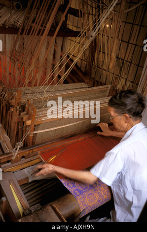 Chengdu Sichuan China Silk brocade cloth being by hand woven on loom in ...
