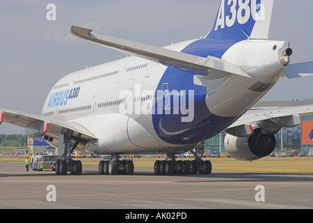 Airbus A380 being pushed back by Douglas DC12 aircraft tug at ...