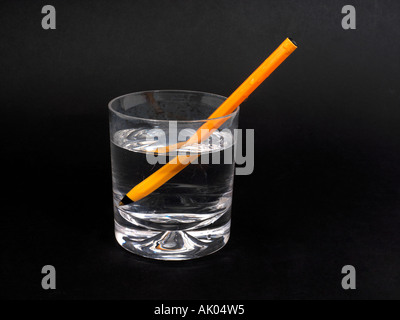 Refraction Pen Refracting in a Glass of Water Stock Photo - Alamy