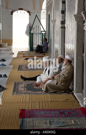 Tripoli, Libya. Old Men Talking, Karamanli Mosque, 18th Century Stock ...