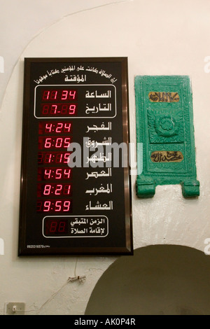 Digital clock showing times of prayer inside the Grand Mosque, Jumeirah ...