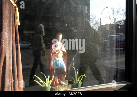 NY Catholic Santos Statue Saint religion window vertical Stock Photo ...