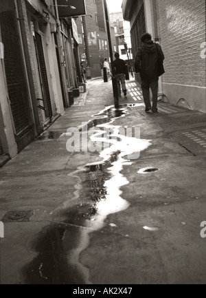 Moody London back alley Stock Photo - Alamy