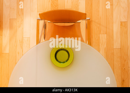 Aerial view of a dining room table place settings with red tablecloth ...