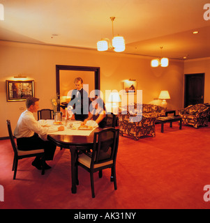 A young couple in the Dining room Stock Photo - Alamy