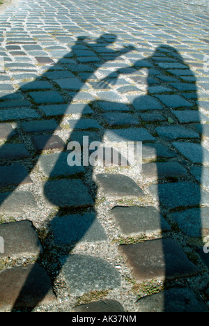 Shadows of two people fighting Stock Photo - Alamy