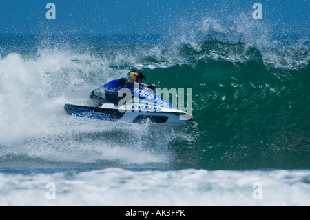 a man speeding on jet ski on lake during summer vacation in Aqaba ...