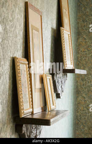 Picture frames on shelf Stock Photo - Alamy