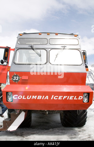 Snow Coach tour bus at the Athabasca Glacier. The Athabasca is the most ...