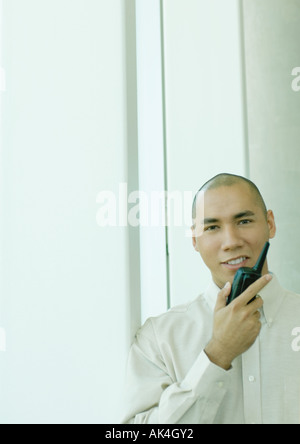 Men with walkie talkies Stock Photo - Alamy