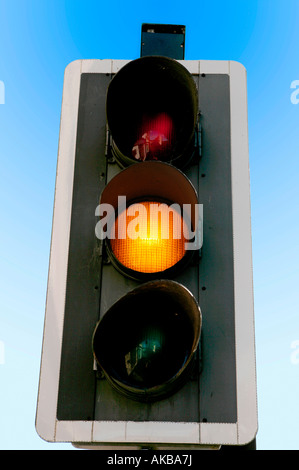 Orange amber traffic light Stock Photo - Alamy