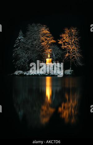 The small island in the Lake Königssee with illuminated John Christian ...