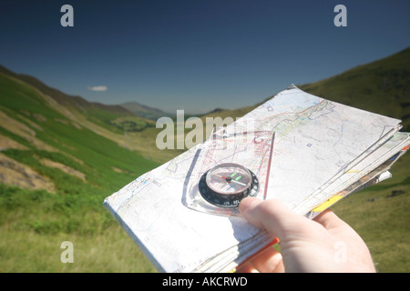 A stock photograph of a Compass and Map with Newlands Valley in Lake ...