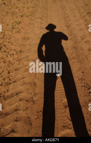 tall long shadow on sand Stock Photo - Alamy