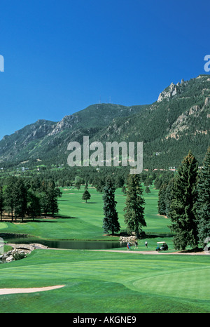 The Broadmoor Resort golf course with Cheyenne Mountain in the ...