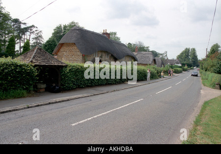 Historic thatched cottages at village of Sandy Lane, Wiltshire, England ...