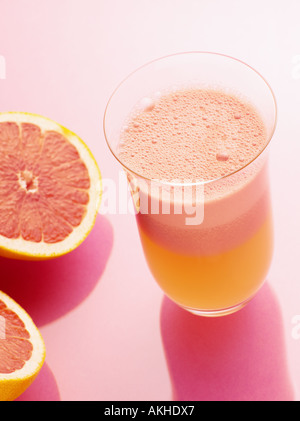 Pink grapefruit juice Stock Photo - Alamy
