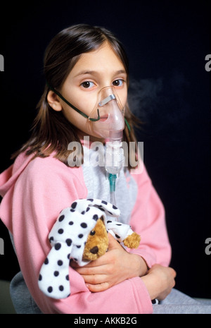 Child Receiving Ventolin Oxygen Treatment with a Nebulizer Stock Photo ...