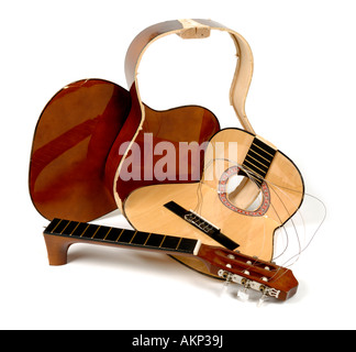 A smashed and broken acoustic guitar Stock Photo - Alamy