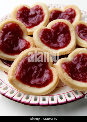 jam tarts with heart shaped pastry lids Stock Photo - Alamy