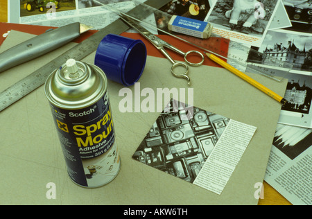 Sticking paper to board with aerosol spray mount Stock Photo - Alamy