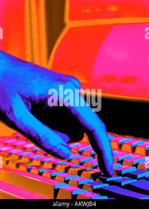 Computer with keyboard and mouse by CPU on wooden table against wall ...