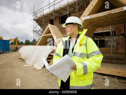 Woman surveyor inspecting a new development Stock Photo: 4924671 - Alamy