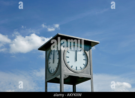 Photo Of Clock Showing 12 O'clock On Yellow Background Stock Photo - Alamy