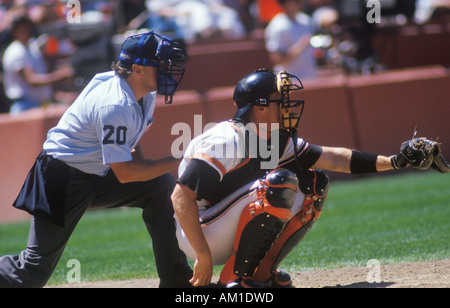 Baseball Catcher behind home plate. Shot from behind a chain link Stock ...