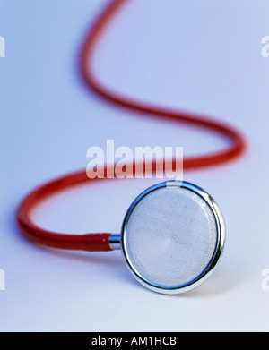 red stethoscope on a plain background Stock Photo - Alamy