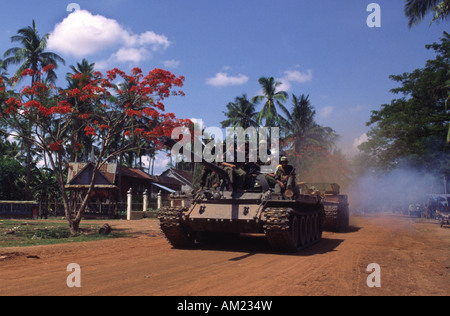 Cambodia, Battambang, Cambodian Army soldiers ride improvised patrol ...