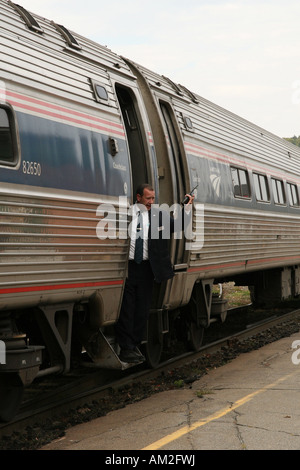 Amtrak railroad conductor Stock Photo - Alamy