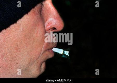 A Man Smoking An Unfiltered Rollup Cigarette Stock Photo - Alamy