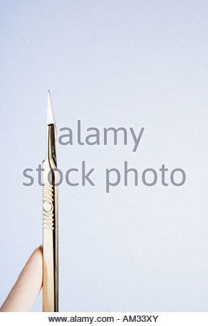 Hand holding scalpel Stock Photo: 55702721 - Alamy