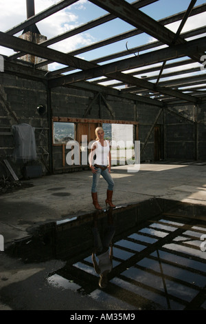 girl standing inside an old rubble roofless building Stock Photo - Alamy