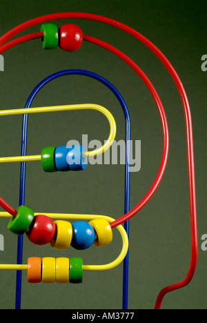 Education concept - abacus with many colorful beads. Red, blue, green ...
