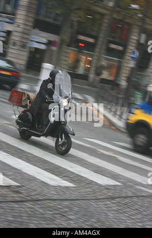 Moped over a Crossing Stock Photo - Alamy