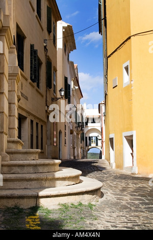 Beautiful narrow alleyway between buildings in an old urban city Stock ...