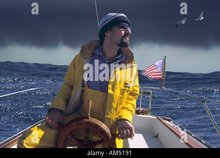 Sailor in foul weather gear Stock Photo - Alamy