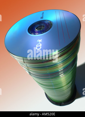 Very tall stack of CDs on a spindle Stock Photo - Alamy