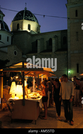 Altea tourists visiting the night market Stock Photo - Alamy