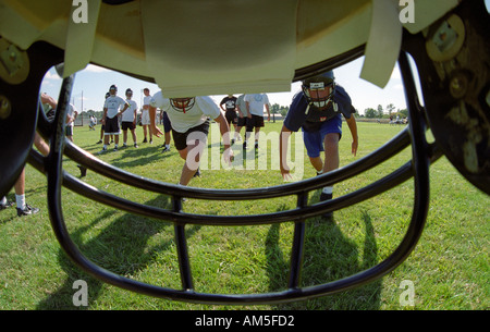 High School senior male football player in different poses with ...