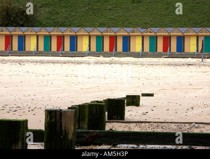 LOWESTOFT BEACH HUTS WITH SEA DEFENCES Stock Photo - Alamy