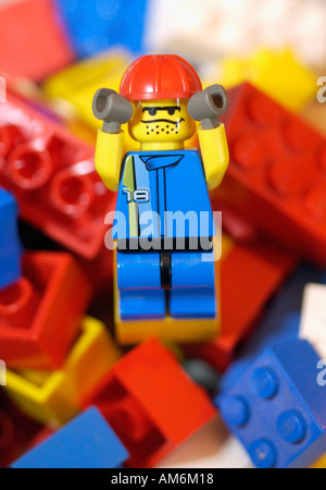 Pile of Lego bricks and a toy figure Stock Photo - Alamy